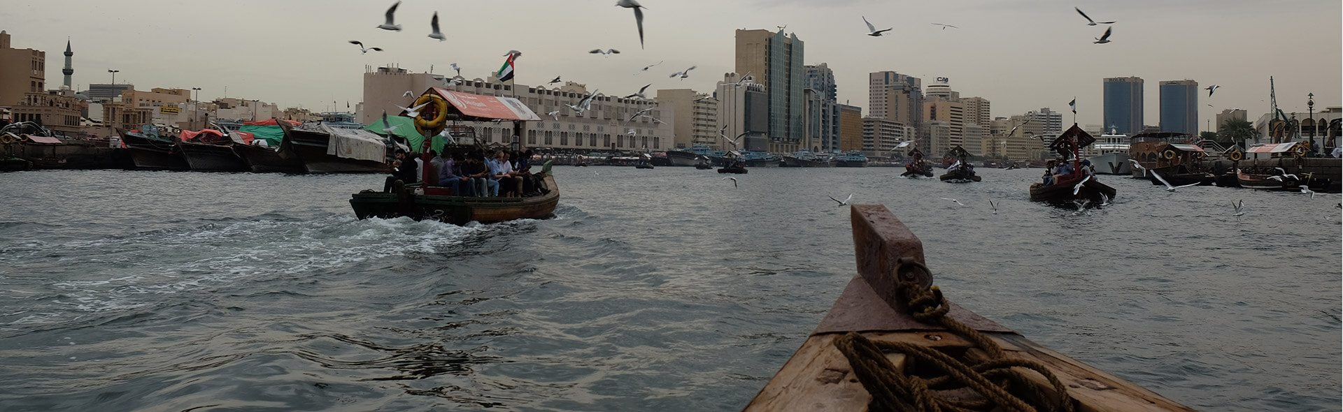 Crossing the Dubai Creek on an abra - Helen on her Holidays